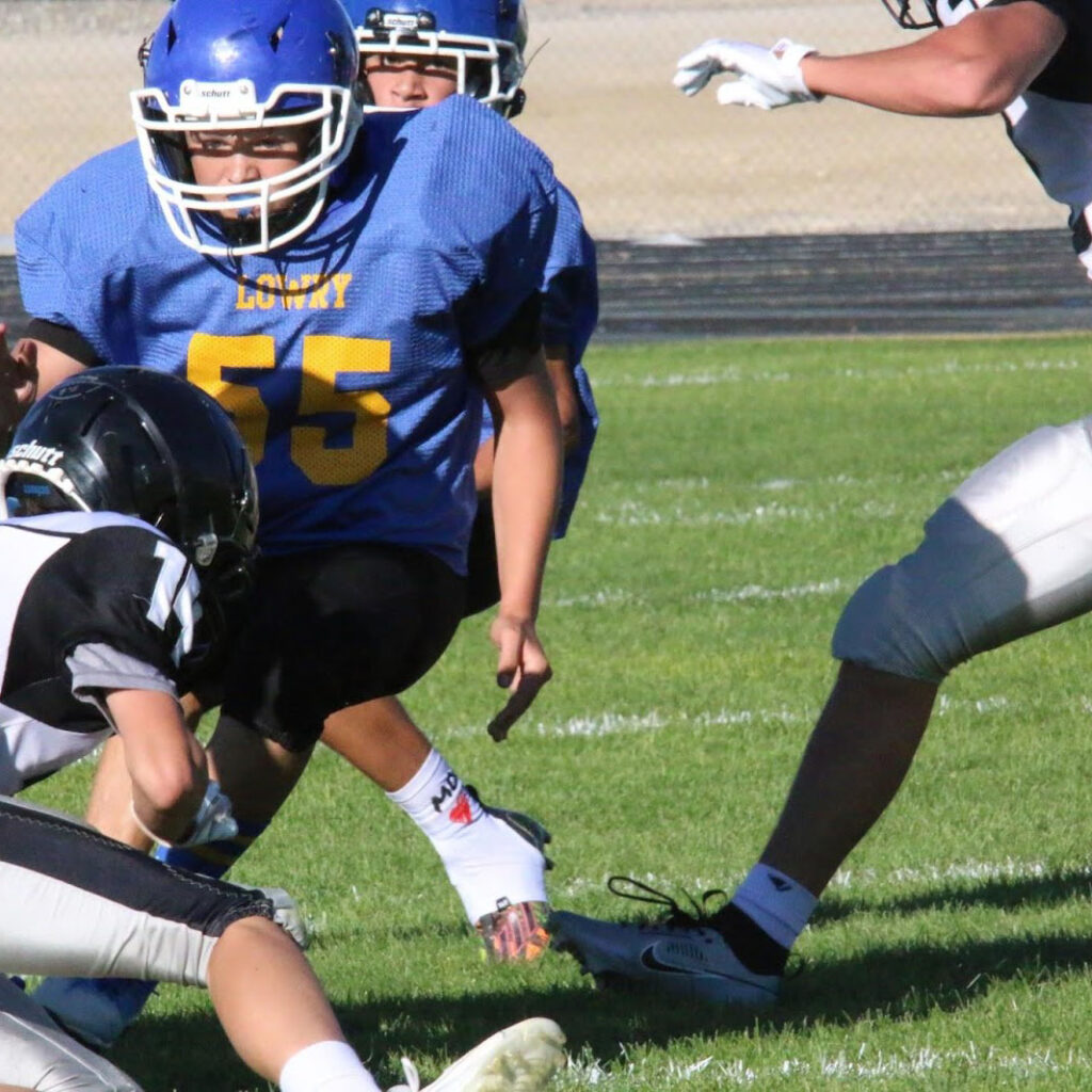 Devyn Kennedy plays hard for freshman football - Lowry High
