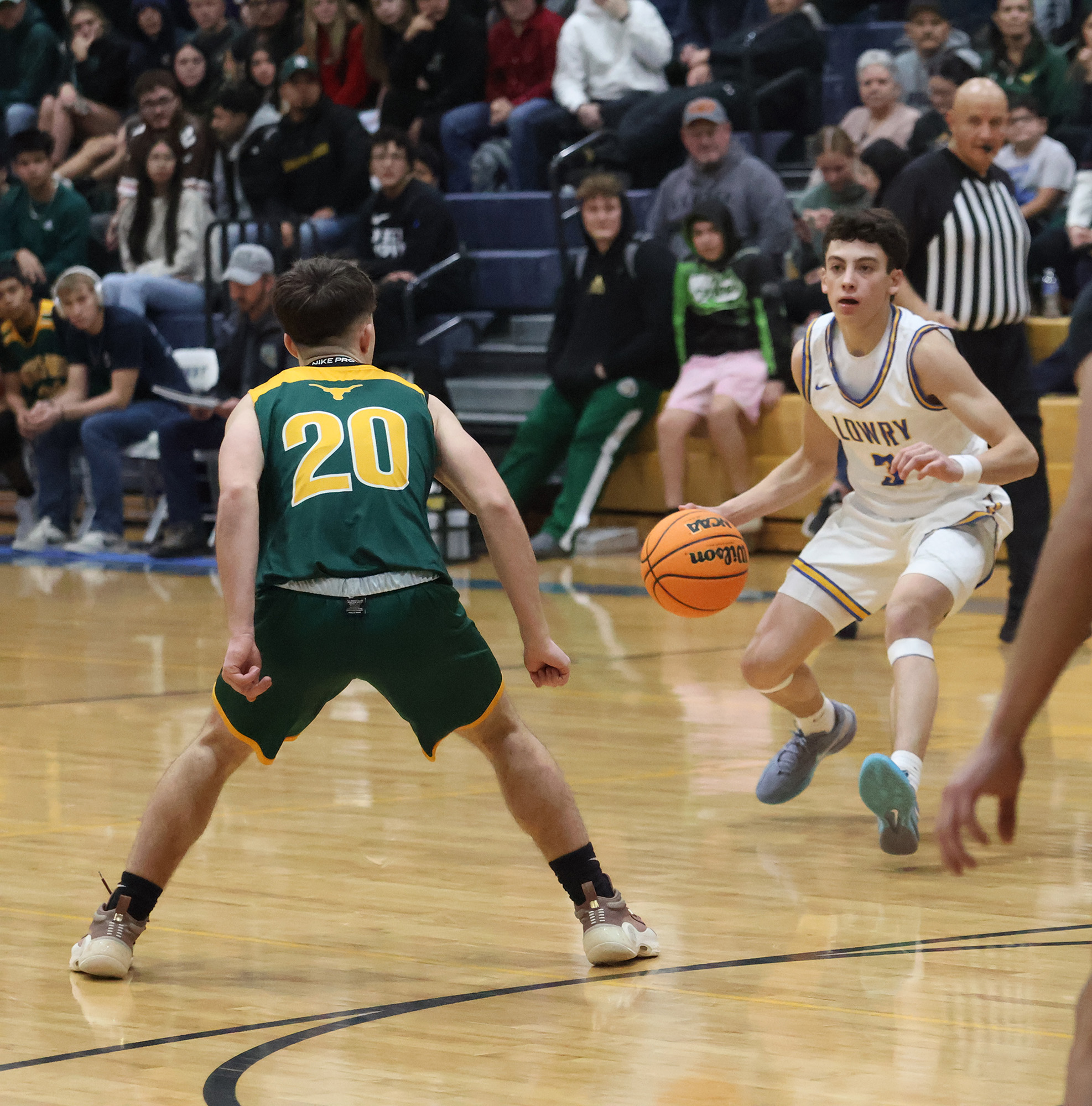 Varsity boy’s basketball jump straight into season - Lowry High